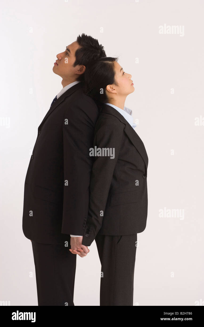 Two women only holding hands back view hi-res stock photography and ...