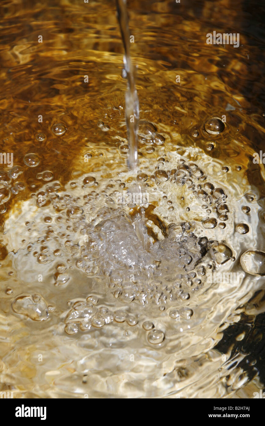 clean water falling into pool on fountain Stock Photo - Alamy