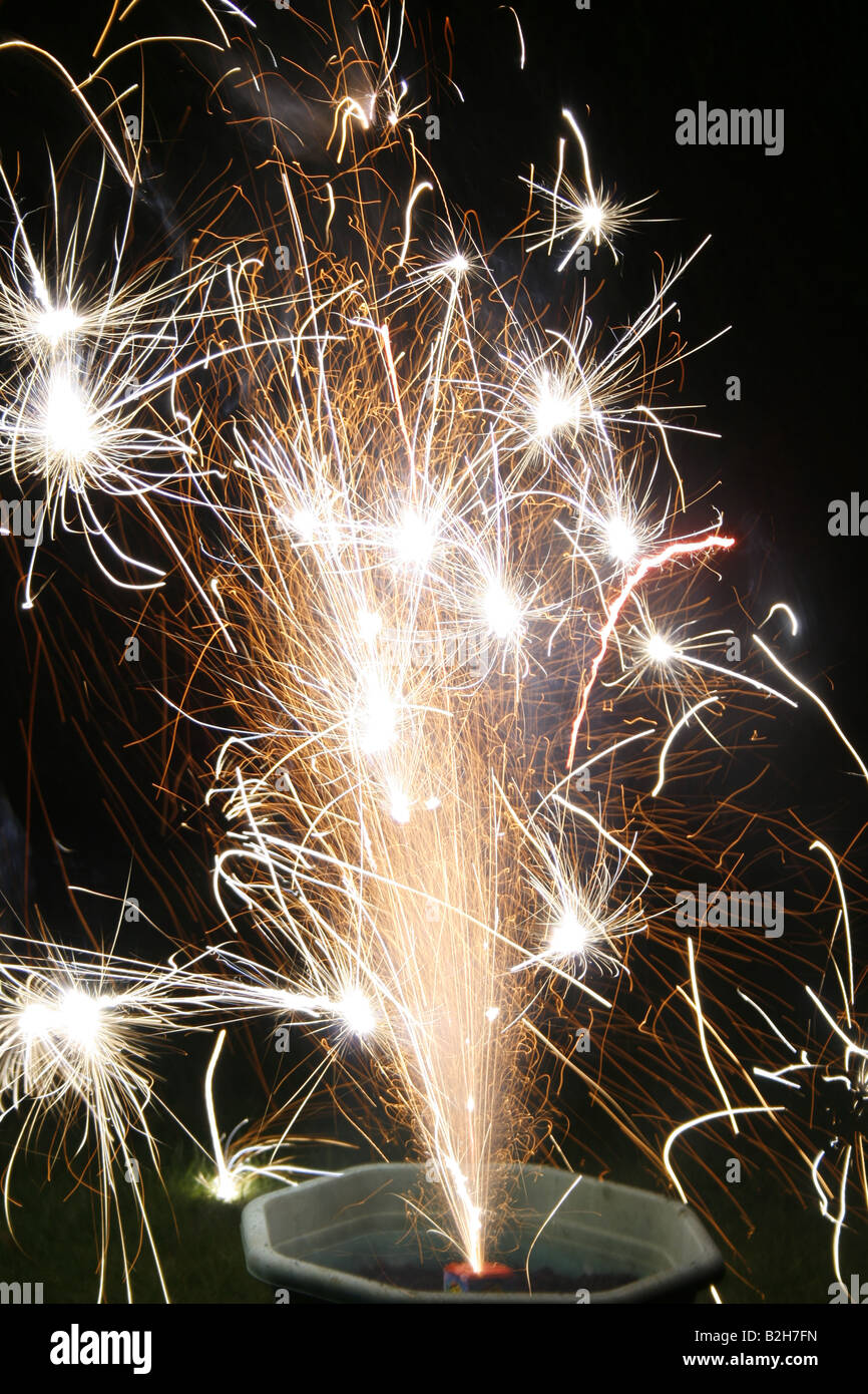 colourful sparks in fireworks display in garden Stock Photo - Alamy