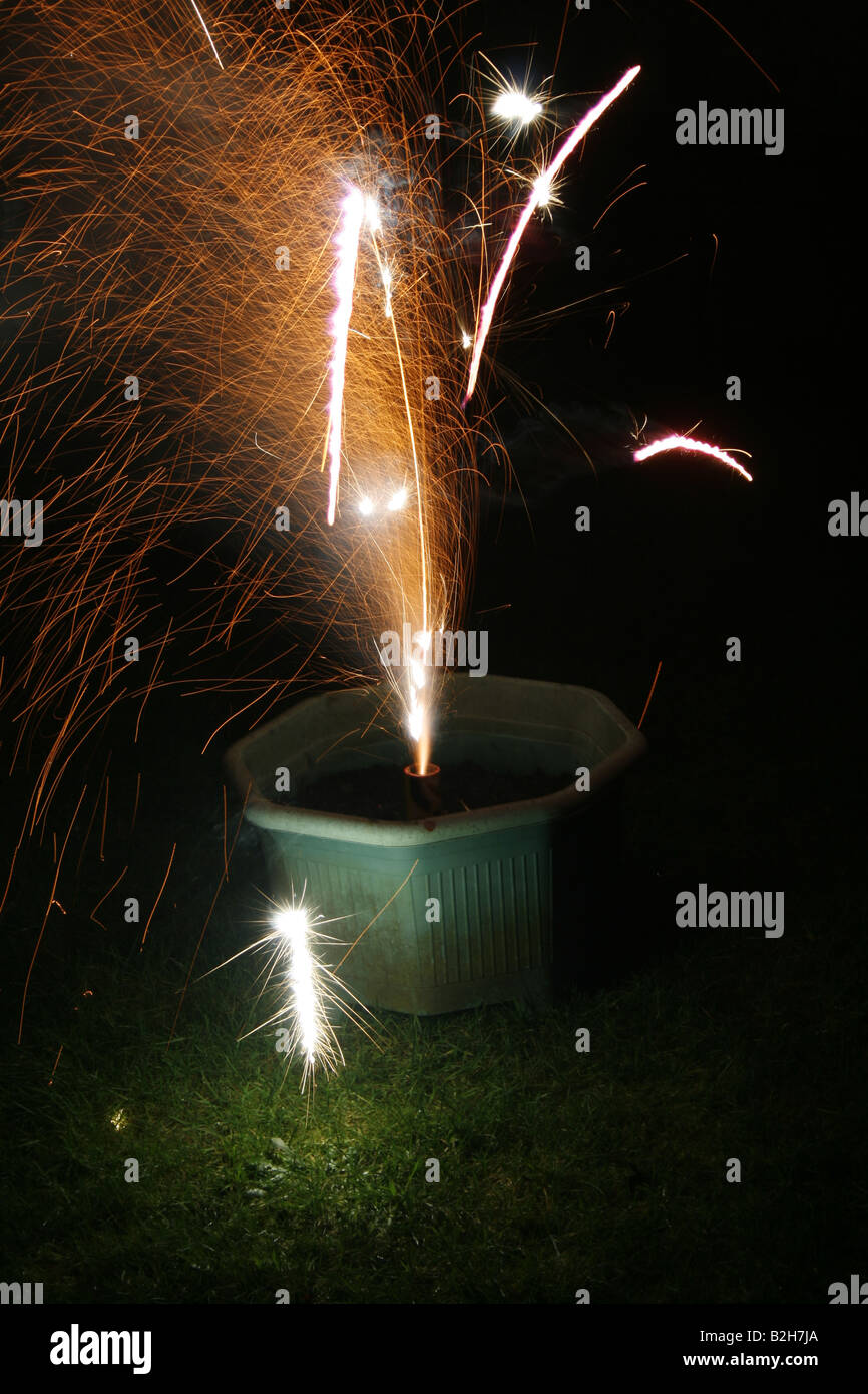 colourful sparks in fireworks display in garden Stock Photo - Alamy