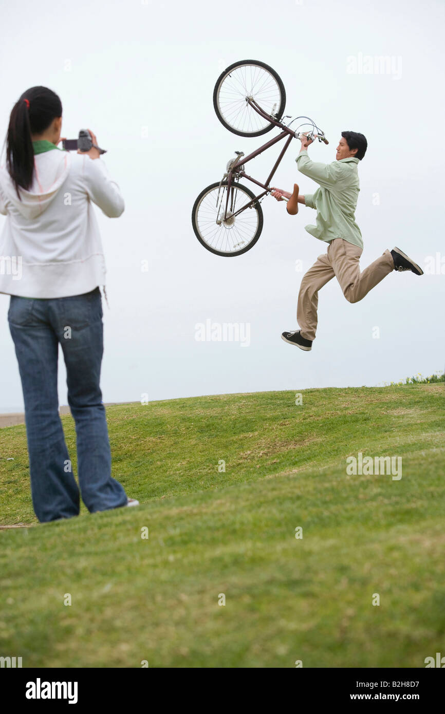 Action video two men jumping hi-res stock photography and images - Alamy