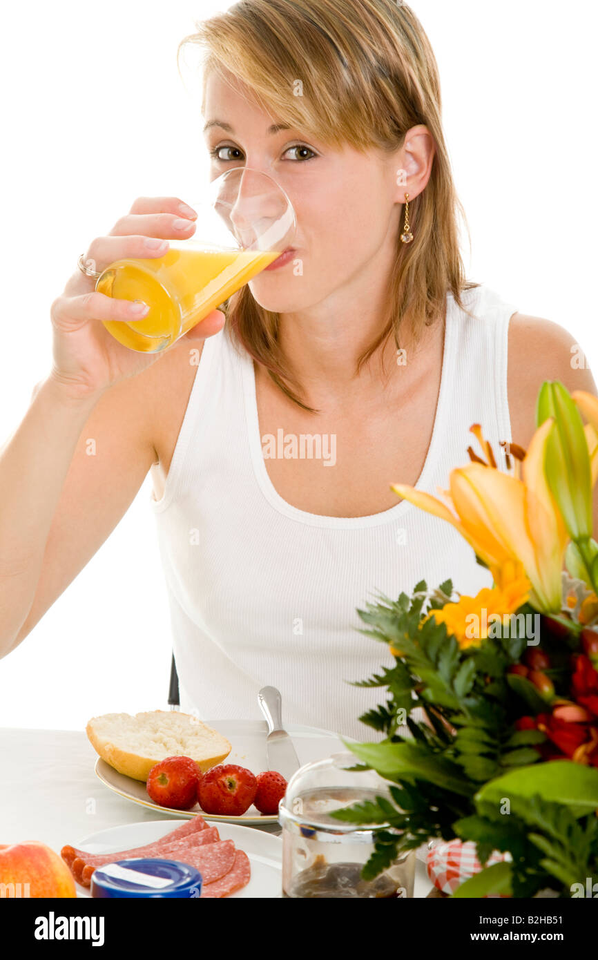 orange squash juice young blond woman breakfast fruits sound food ...