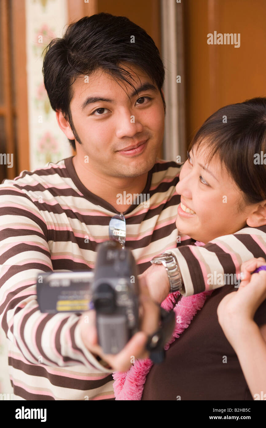 Young couple filming themselves hi-res stock photography and images - Alamy