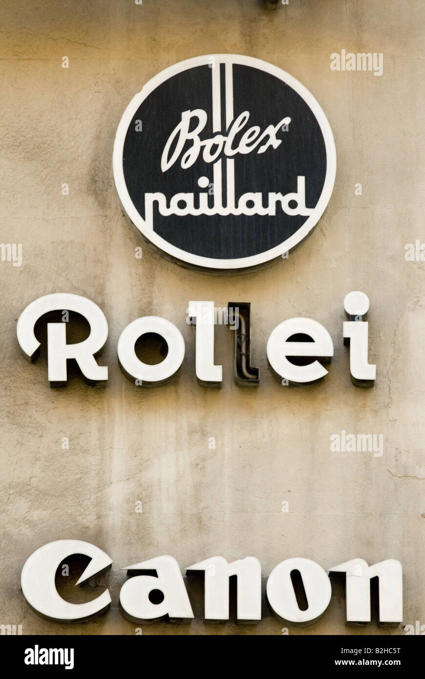 rollei canon sign in a wall barcelona Stock Photo - Alamy