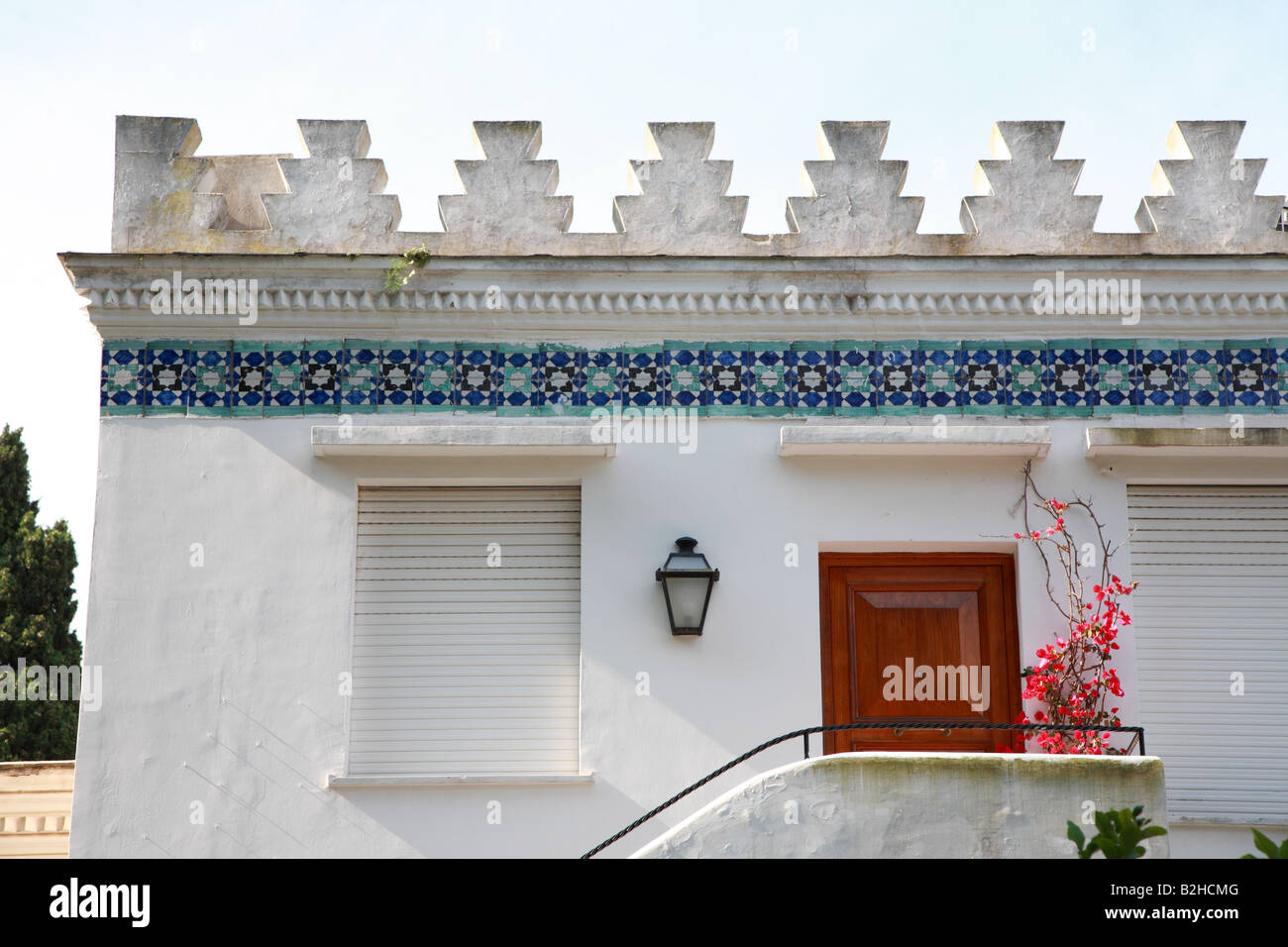 villa on island of Capri with crenellated roof and ceramic tiles border ...