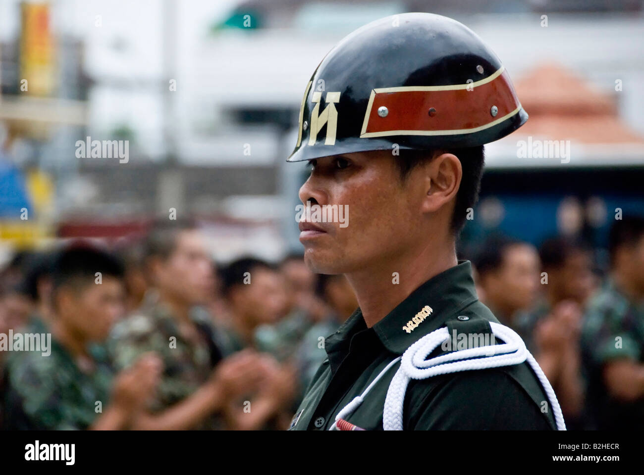 Thai military officers at a celebration of the beginning of Buddhist ...