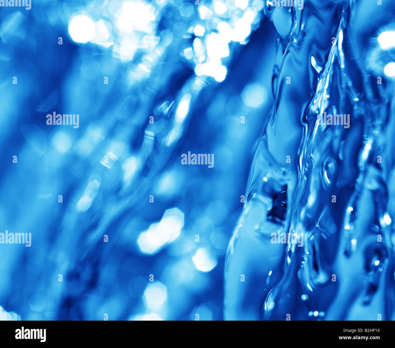 Blue pouring water Stock Photo - Alamy