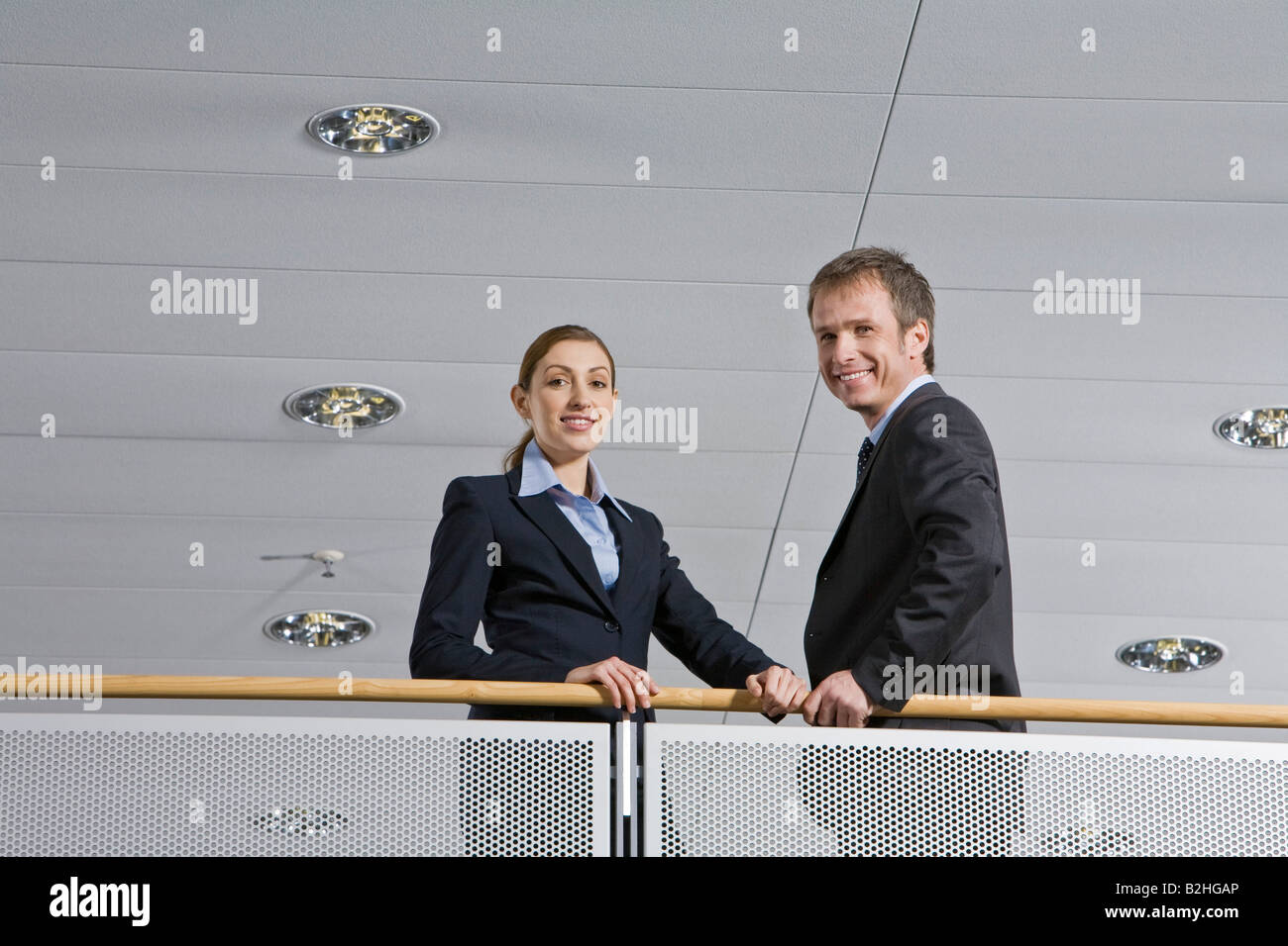 Two business woman standing hi-res stock photography and images - Alamy