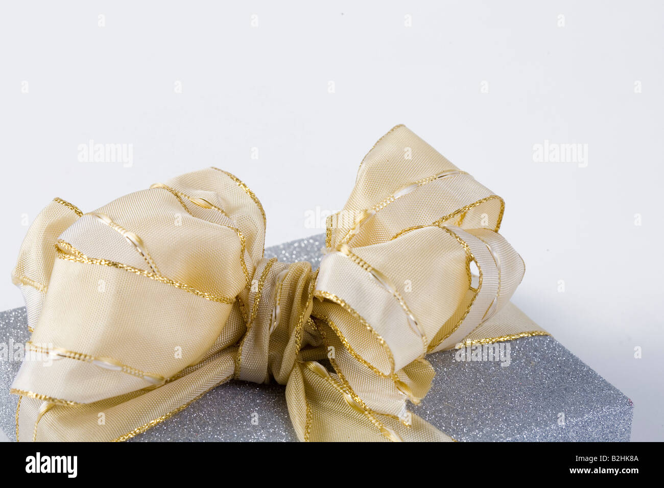 still life of blue present with white ribbon Stock Photo - Alamy