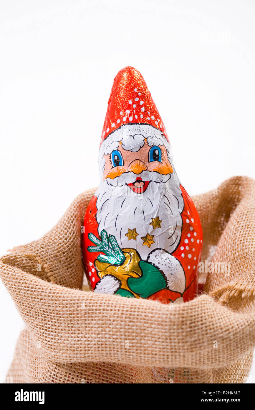 still life of chocolate santa claus in sack Stock Photo - Alamy
