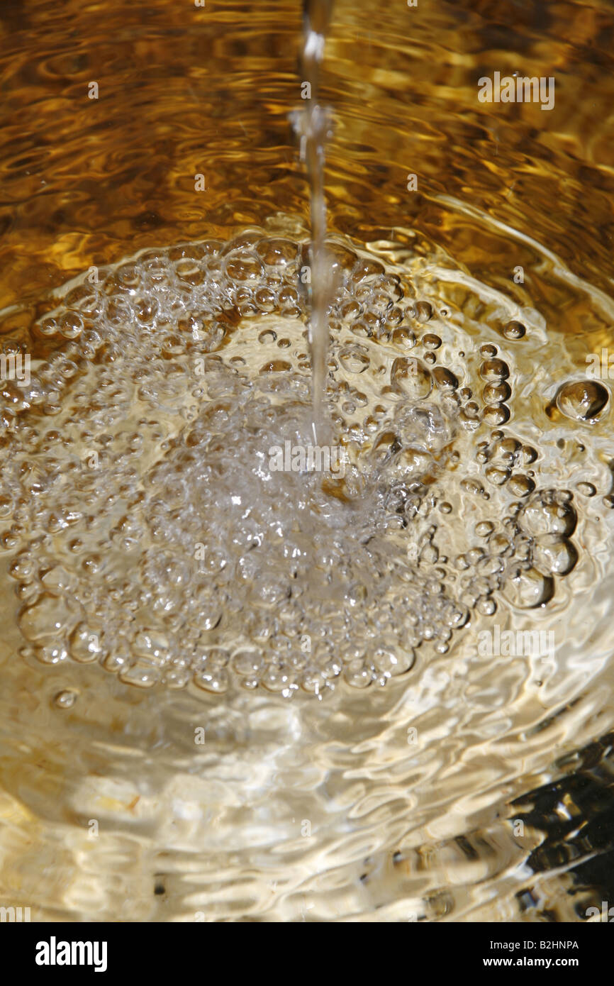 clean water falling into pool on fountain Stock Photo - Alamy