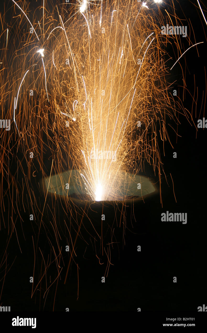 colourful sparks in fireworks display in garden Stock Photo - Alamy