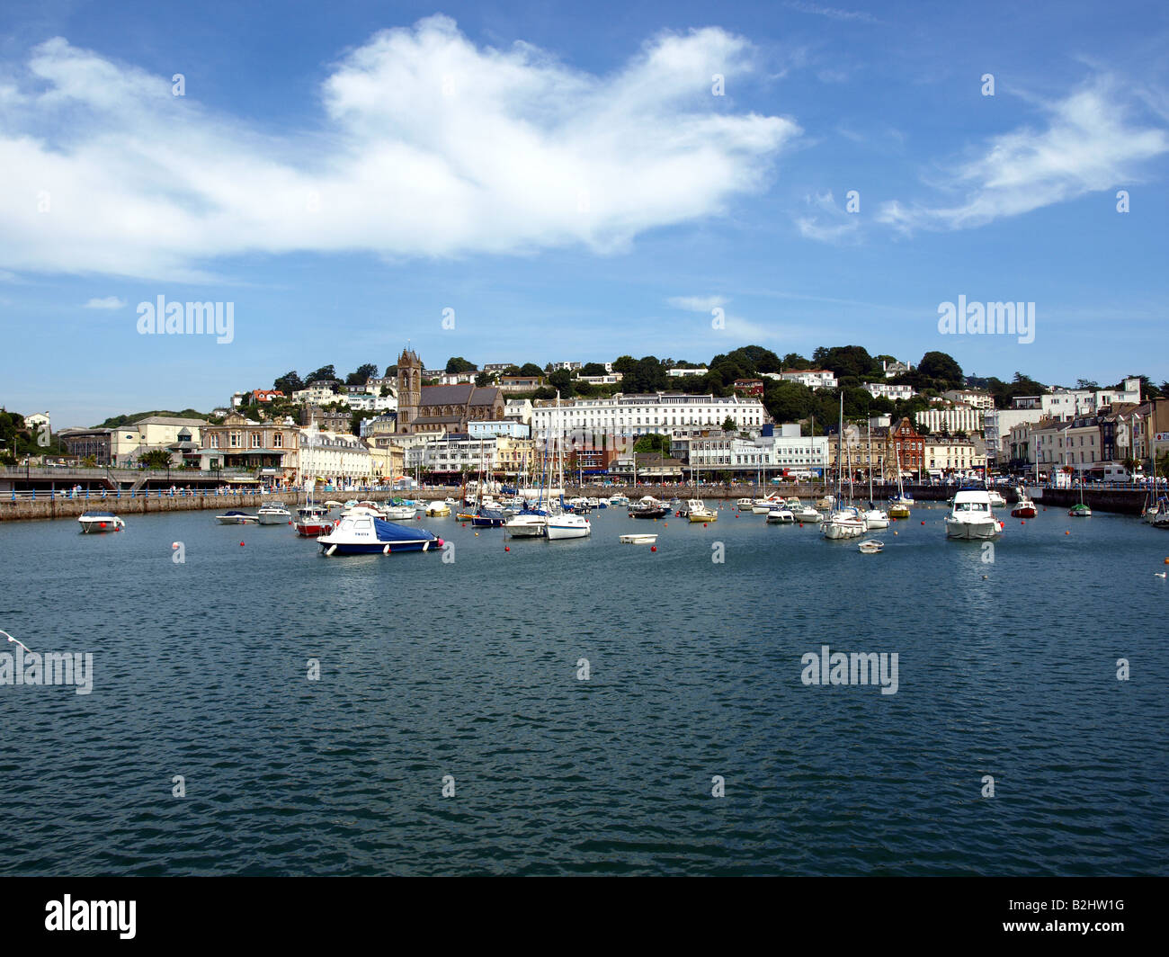 The view of Torquay Harbour and town with church and hotels Stock Photo ...