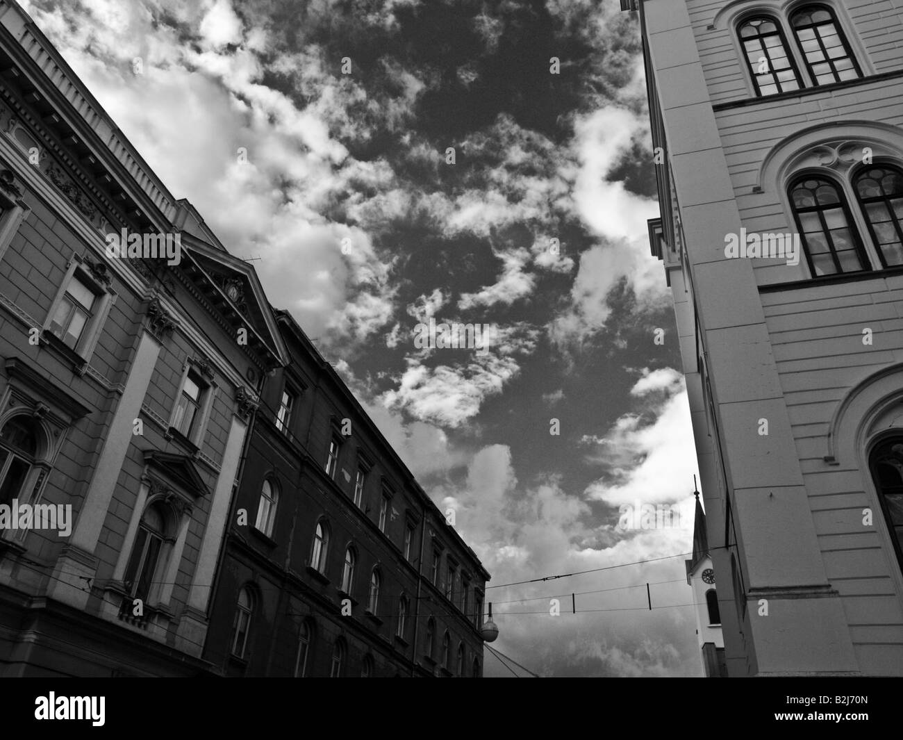 Black and White image of upper part of two buildings Stock Photo - Alamy