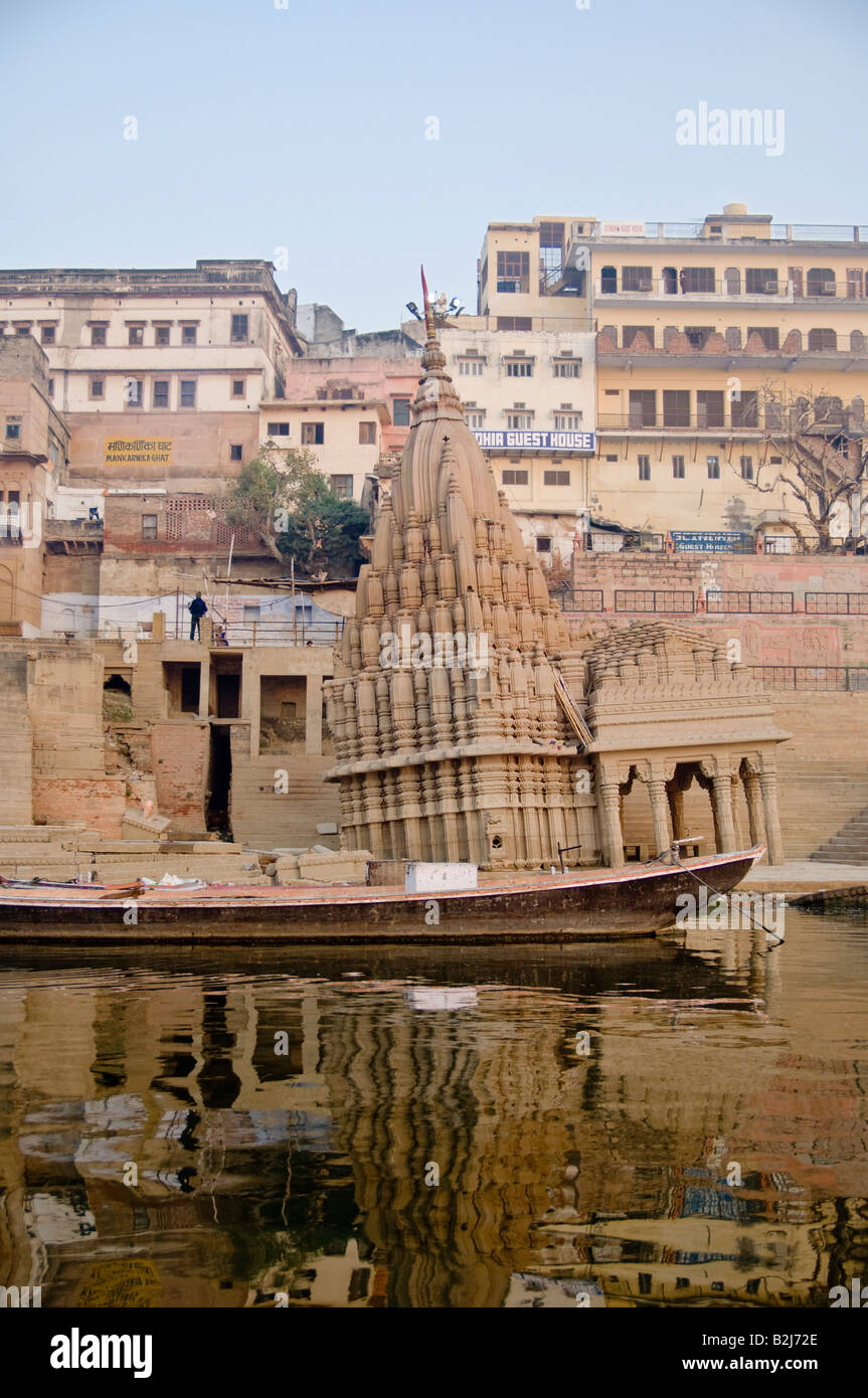 Tilting Hindu temple in Varanasi, on the banks of the river Ganges ...