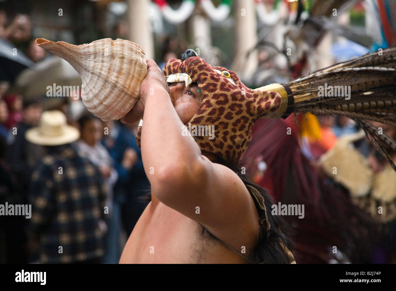 Blowing conch shell horn hi-res stock photography and images - Alamy