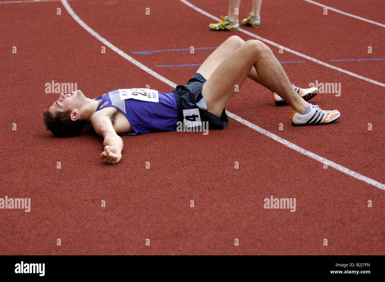 Exhausted Athlete After Race High Resolution Stock Photography and ...