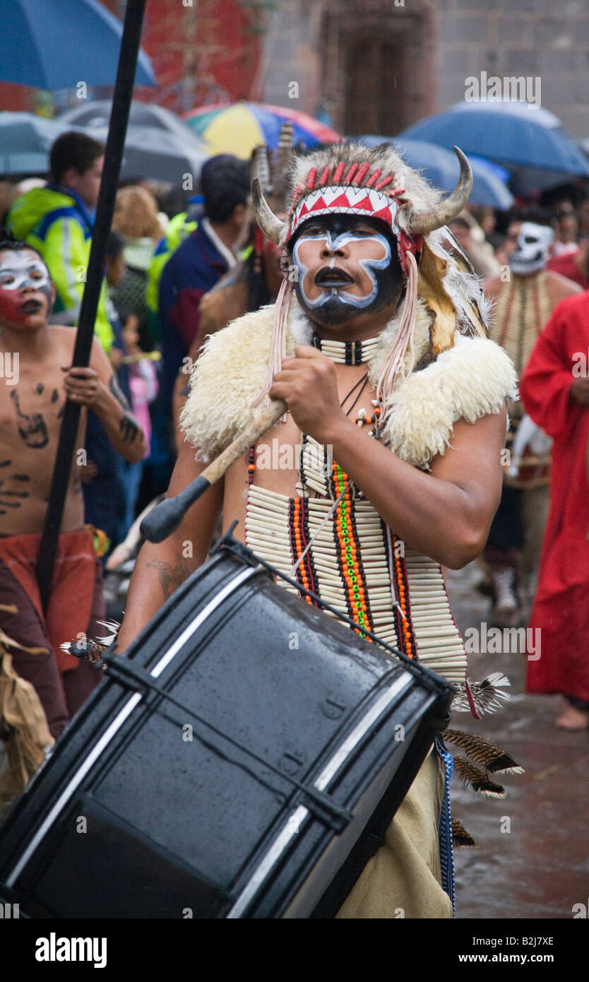 A MEXICAN WARRIOR in AZTEC DRESS DRUMS during the FESTIVAL DE SAN ...