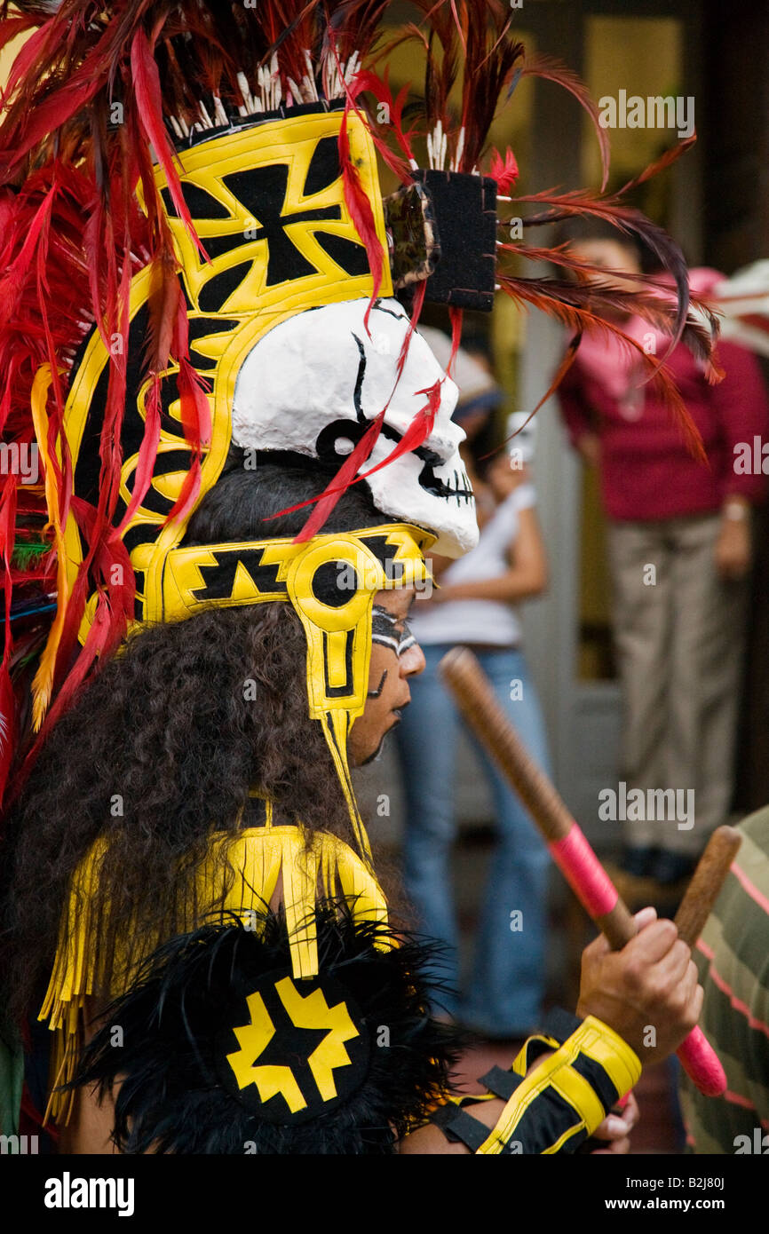 A man in AZTEC INDIAN COSTUME participates in the FESTIVAL DE SAN ...