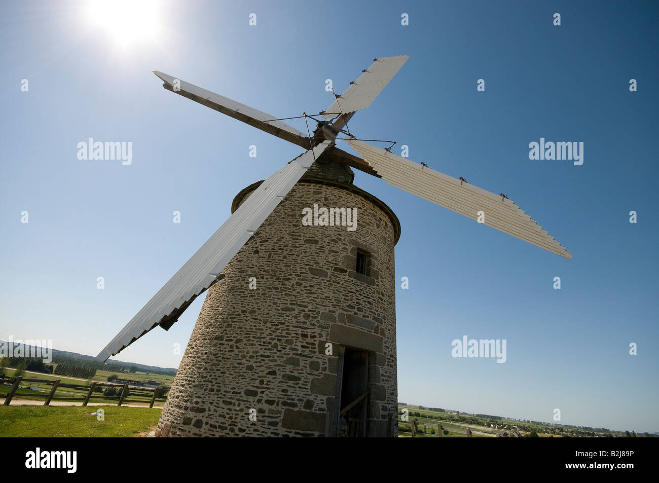 traditional stone windmill, normandy, france Stock Photo - Alamy