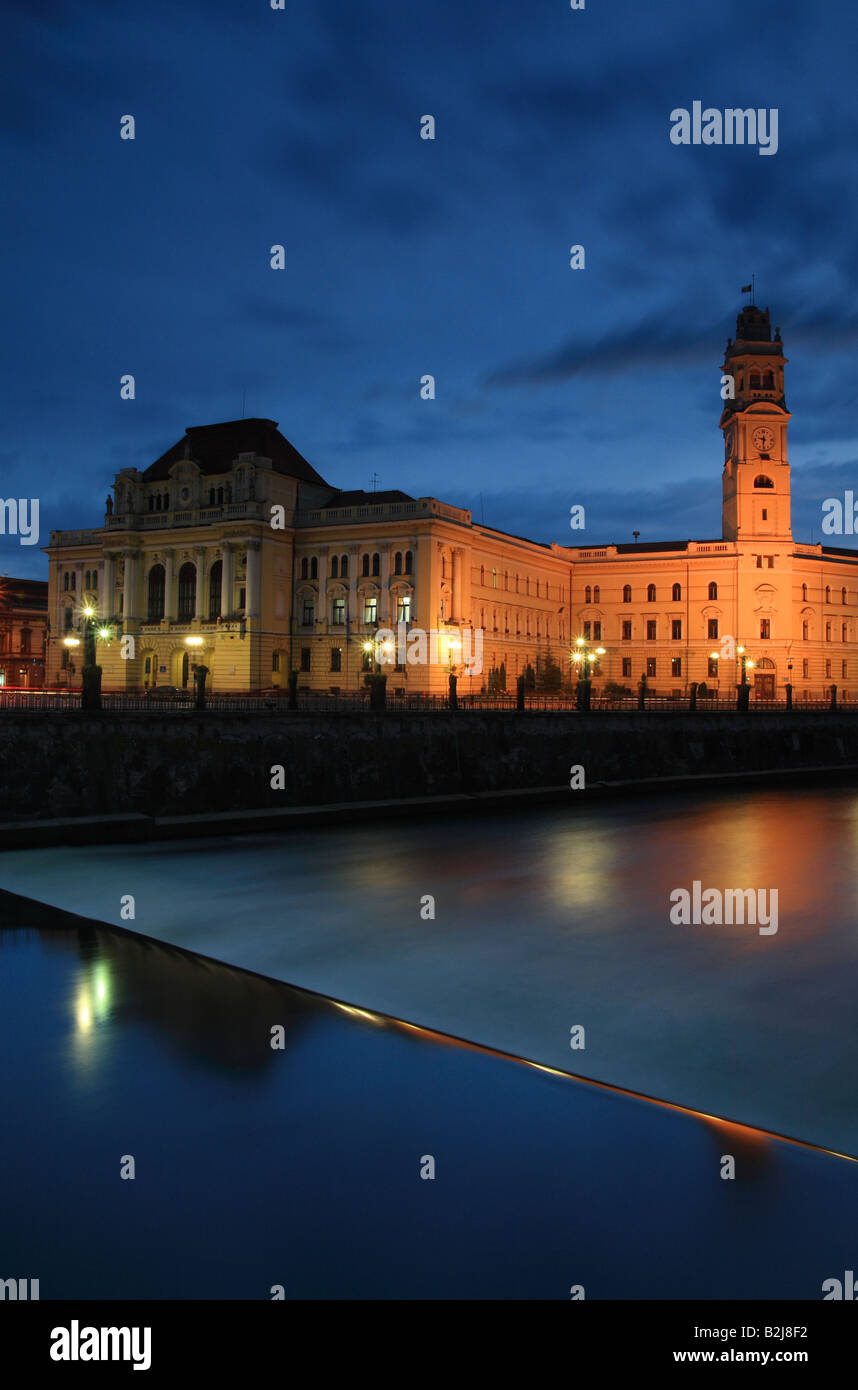 The city hall and the clock tower from Oradea, Romania viewed by night ...