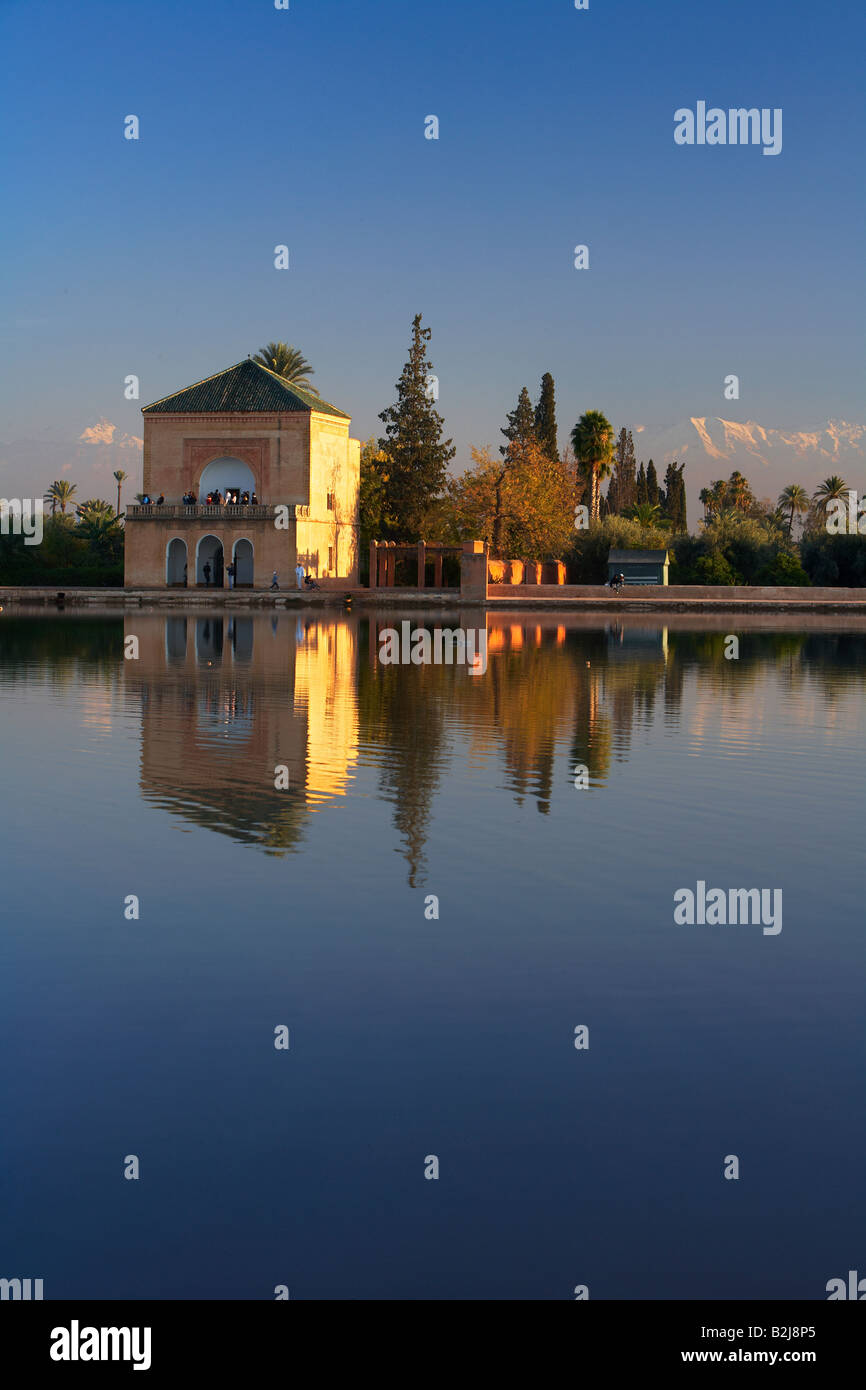 the pool and pavillion in the Menara Imperial Garden, with the Atlas ...