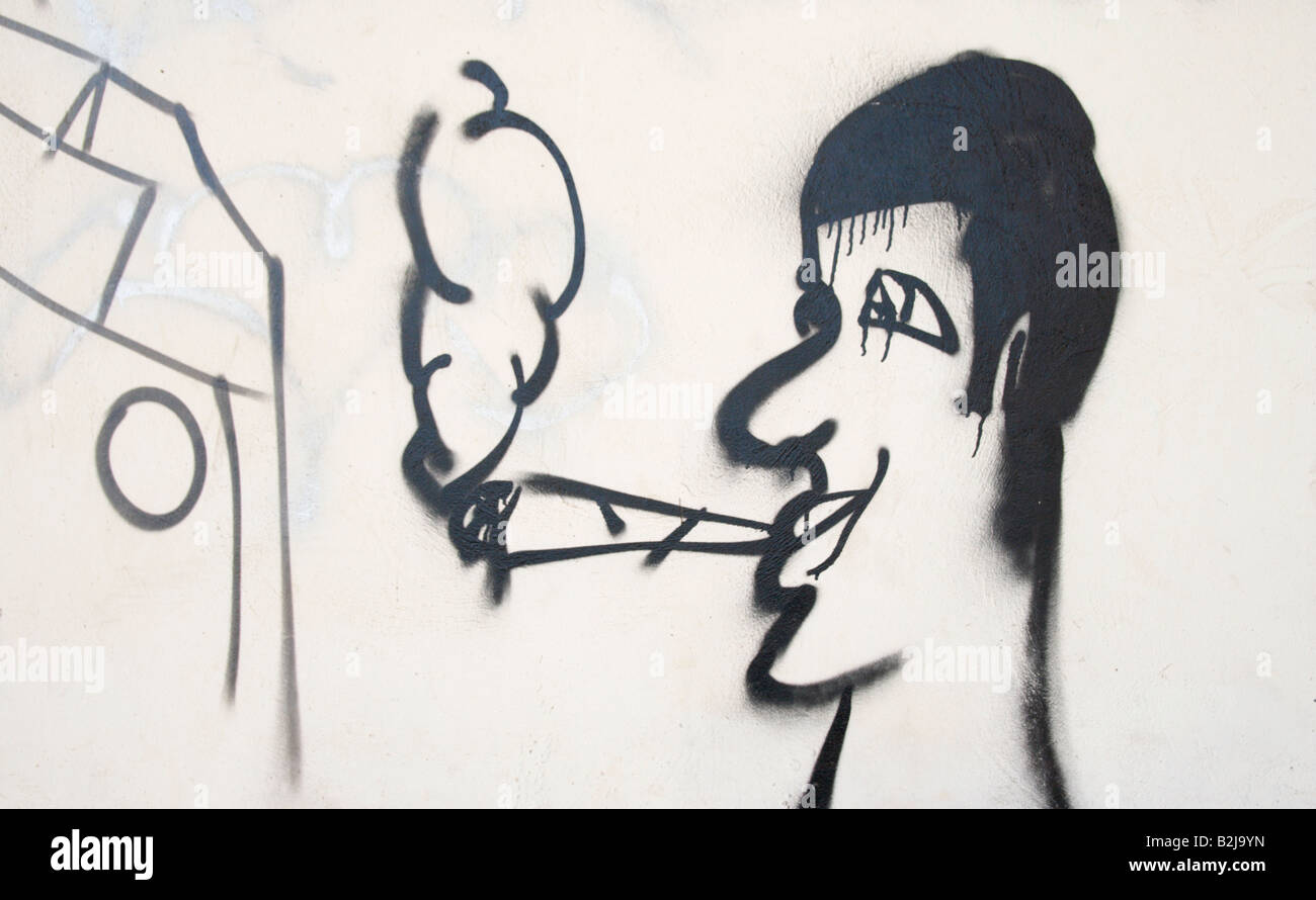 Graffiti of someone smoking a joint Stock Photo - Alamy