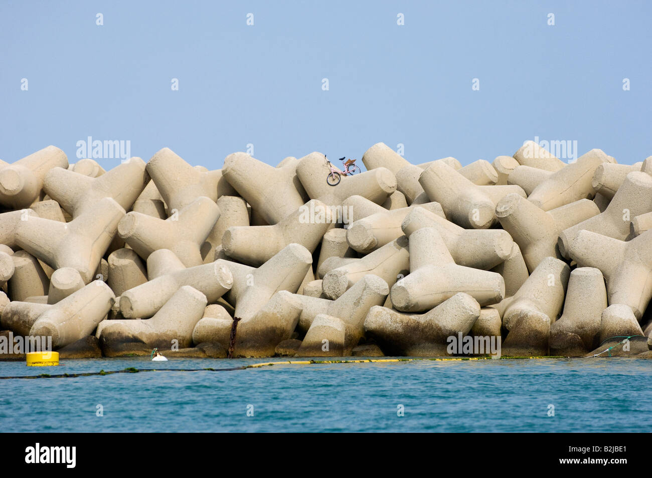 Bicycle abandoned on some unusual shaped rocks Stock Photo - Alamy