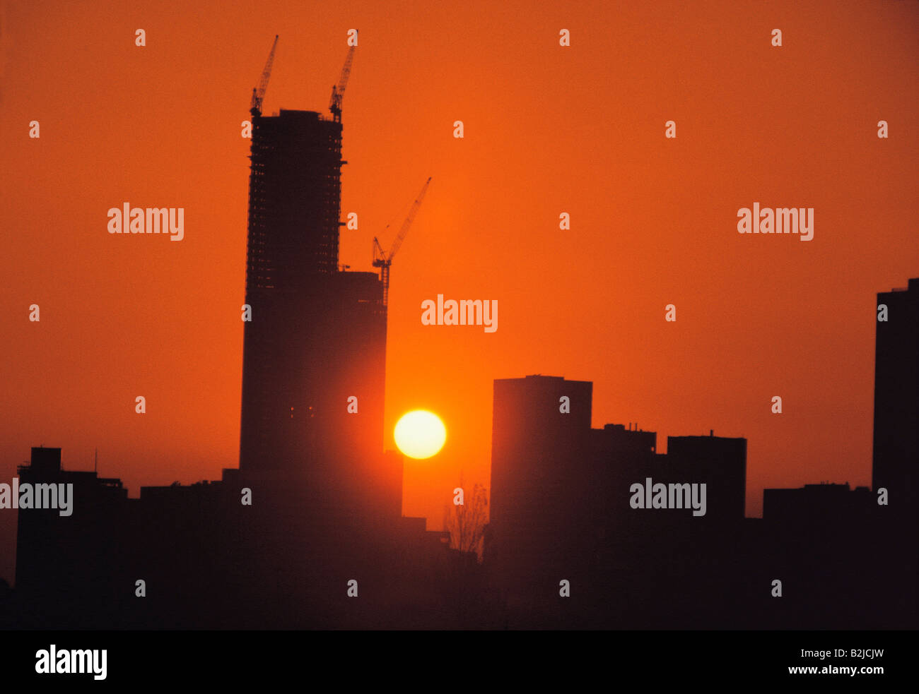 High rise building construction by sunset. Melbourne Rialto hotel ...
