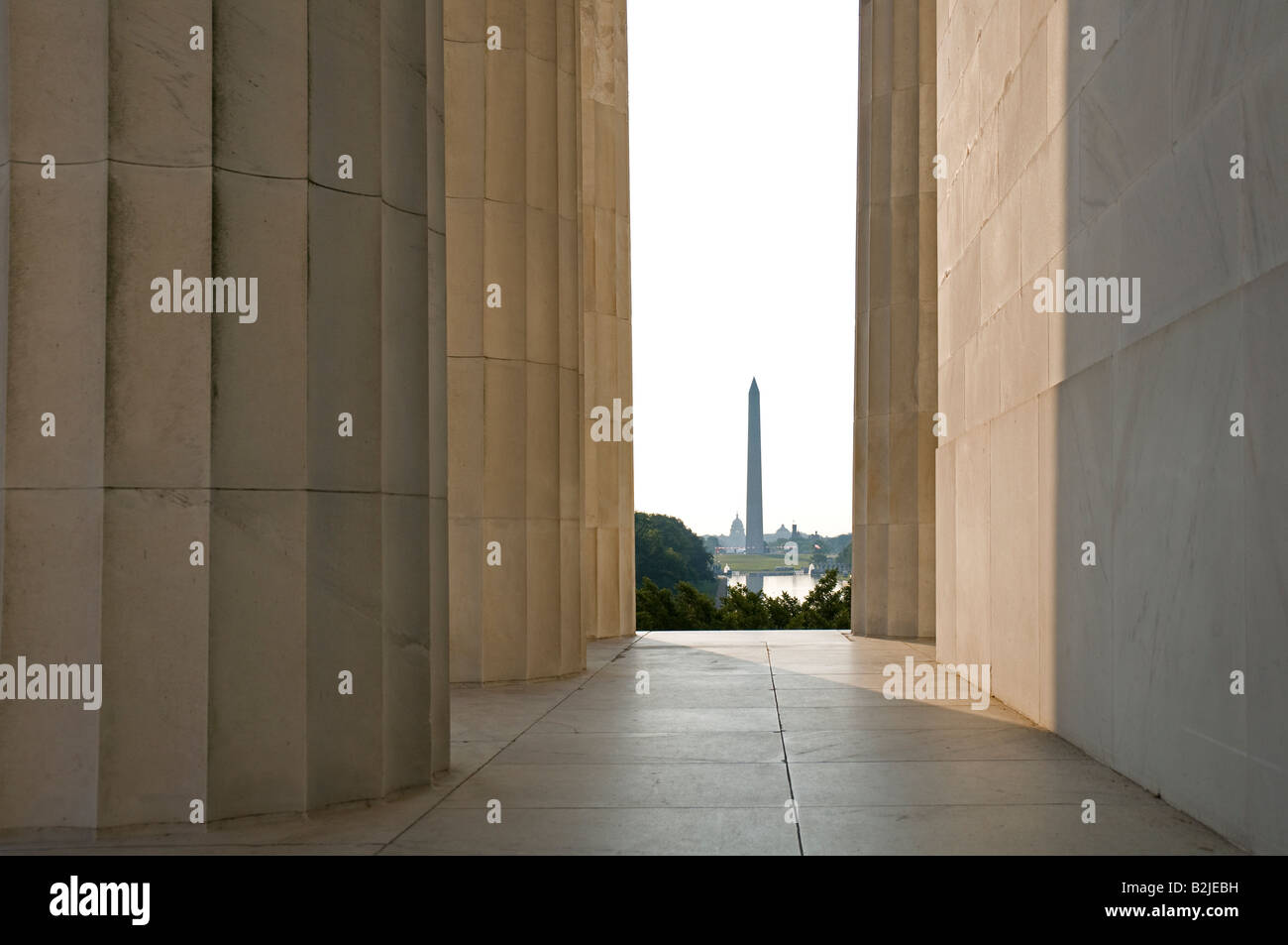 The Capitol building and Washington Monument framed by the columns of ...