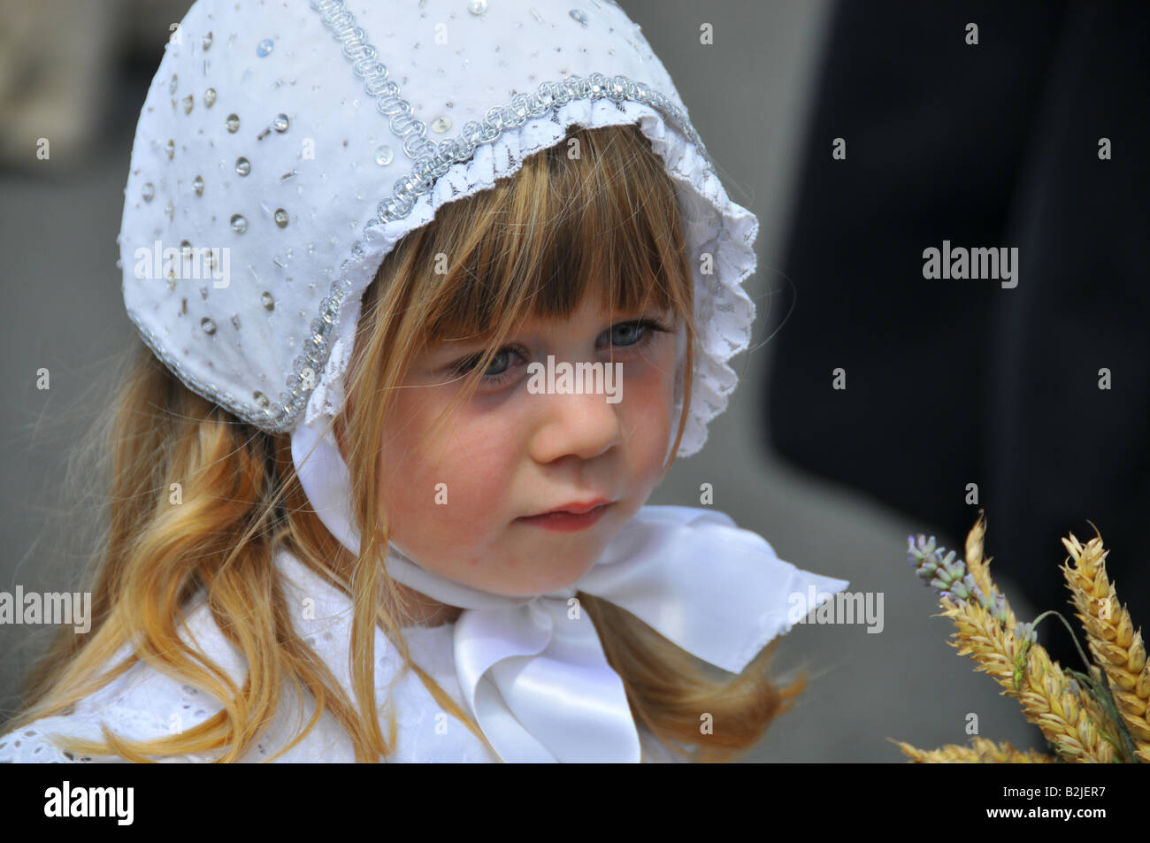 french kid dressed in traditional costume with headgear in the Cornwall ...