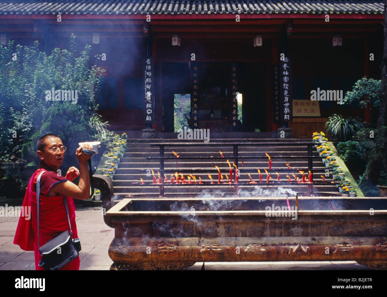 Monk filming temple hi-res stock photography and images - Alamy