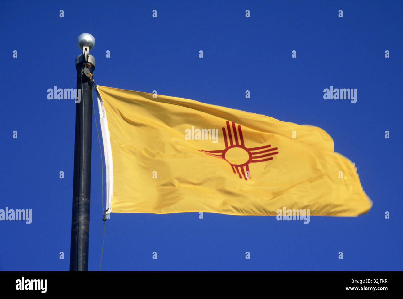 State flag Yellow Red symbol STATE FLAG NEW MEXICO USA Stock Photo - Alamy