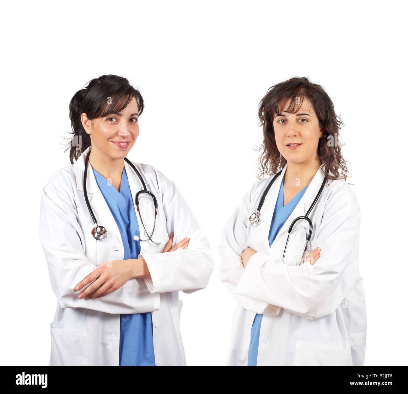 Two female doctors isolated on a white background Stock Photo - Alamy