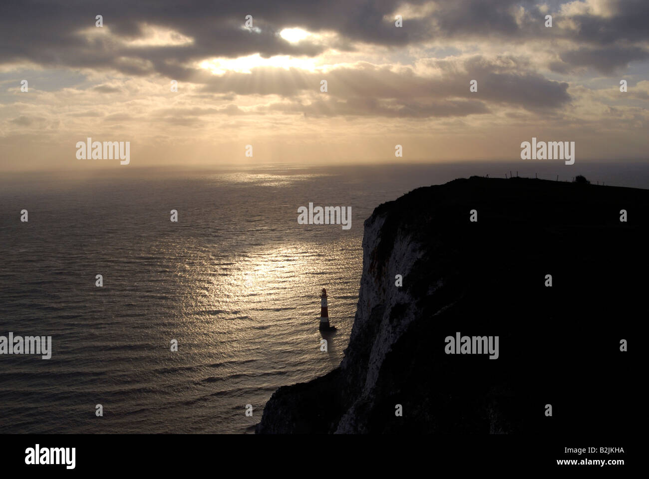 The lighthouse and cliffs at Beachy Head at sunset, Sussex, UK Stock ...