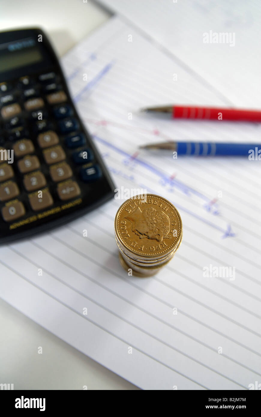 A stack of coins being counted, trying to pay the bills / final demand ...
