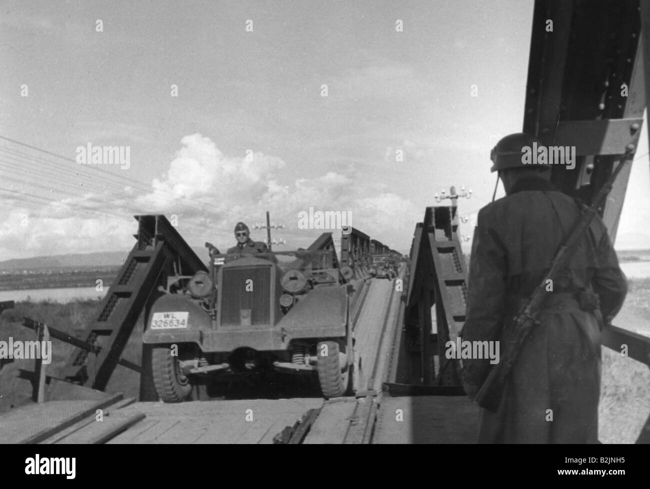 Tractor crossing bridge Black and White Stock Photos & Images - Alamy