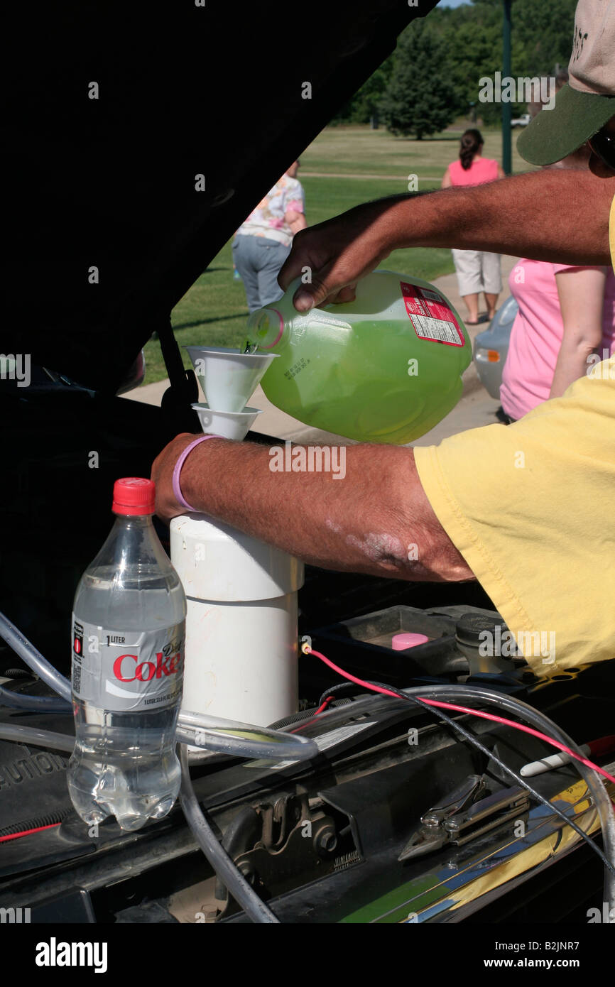 Adding electrolyte to pickup engine modified to burn efficently using ...