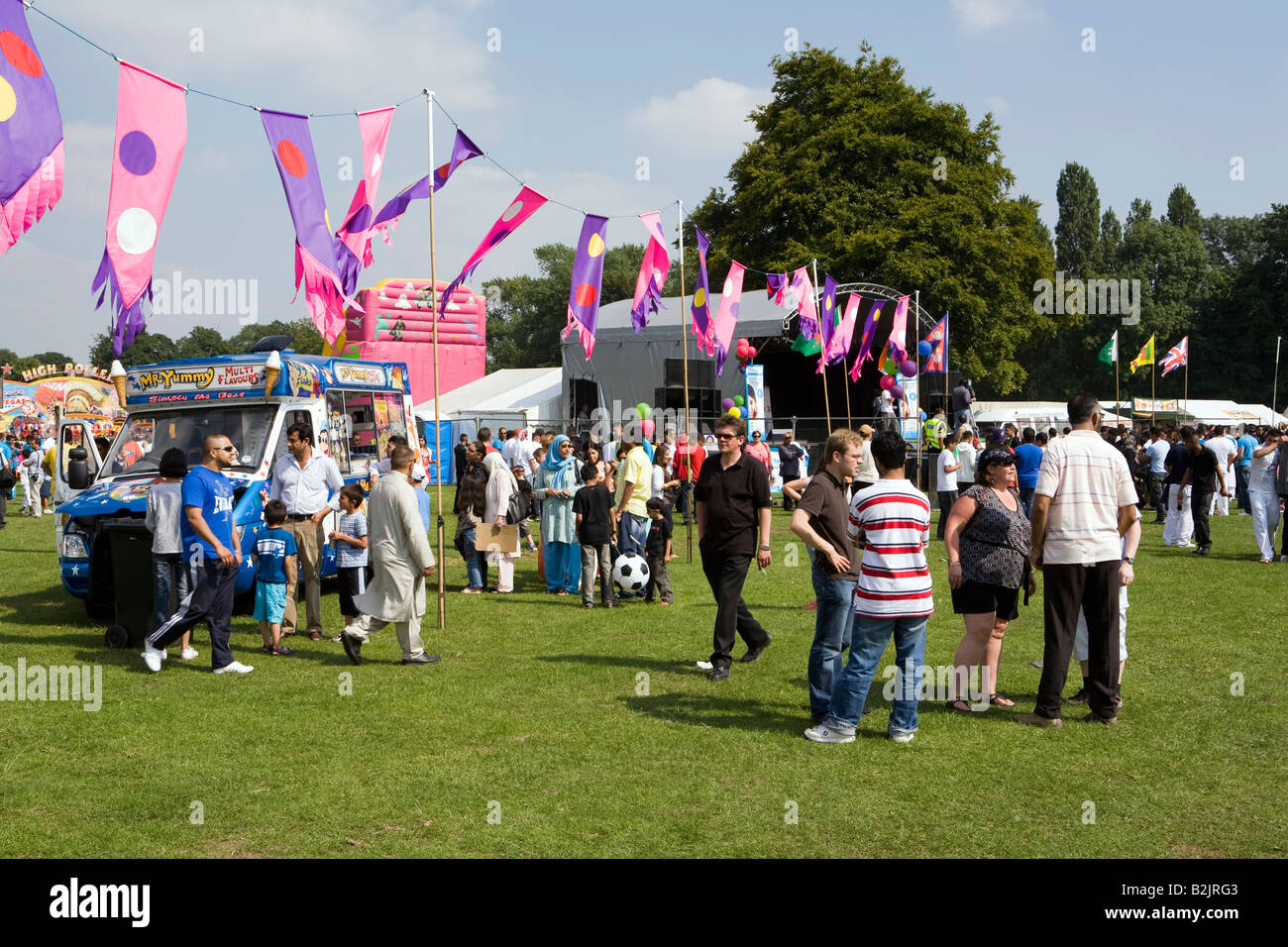 UK England Manchester Platt Fields Mega Mela visitors Stock Photo - Alamy