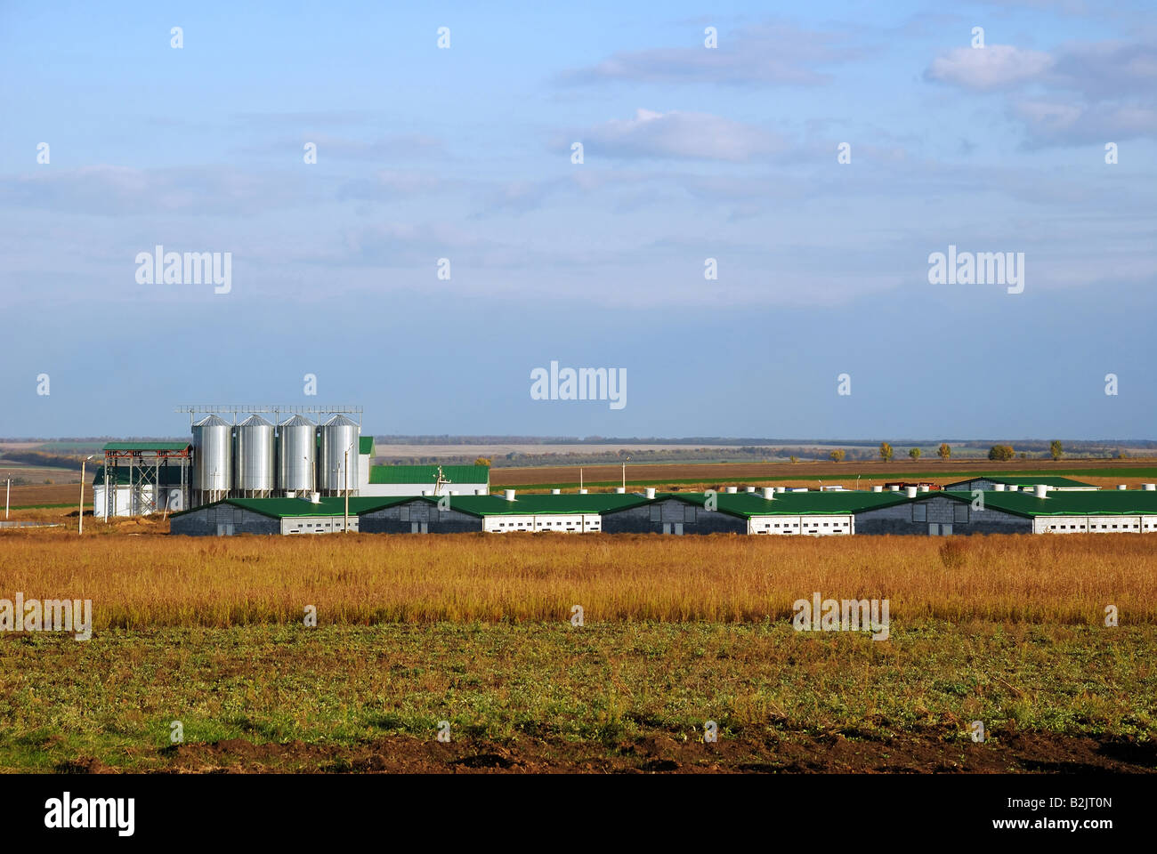 Modern farm A picture of a farm with modern barns and constructions ...