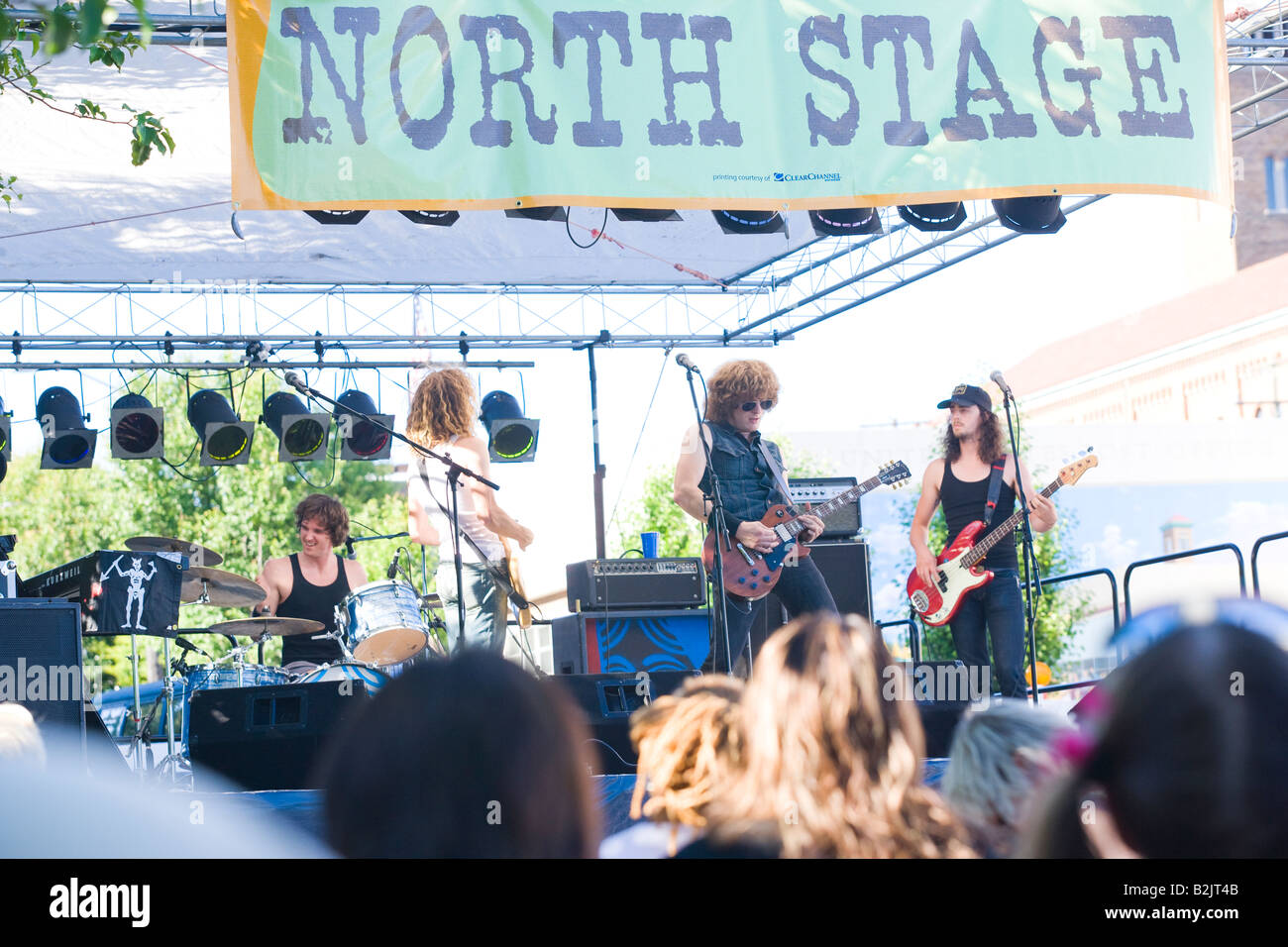 Photographs of rock and roll band Shim playing at the North stage at ...