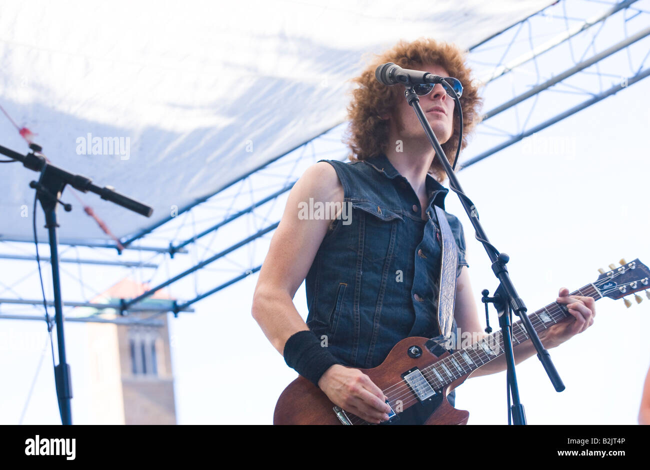 Photographs of rock and roll band Shim playing at the North stage at ...