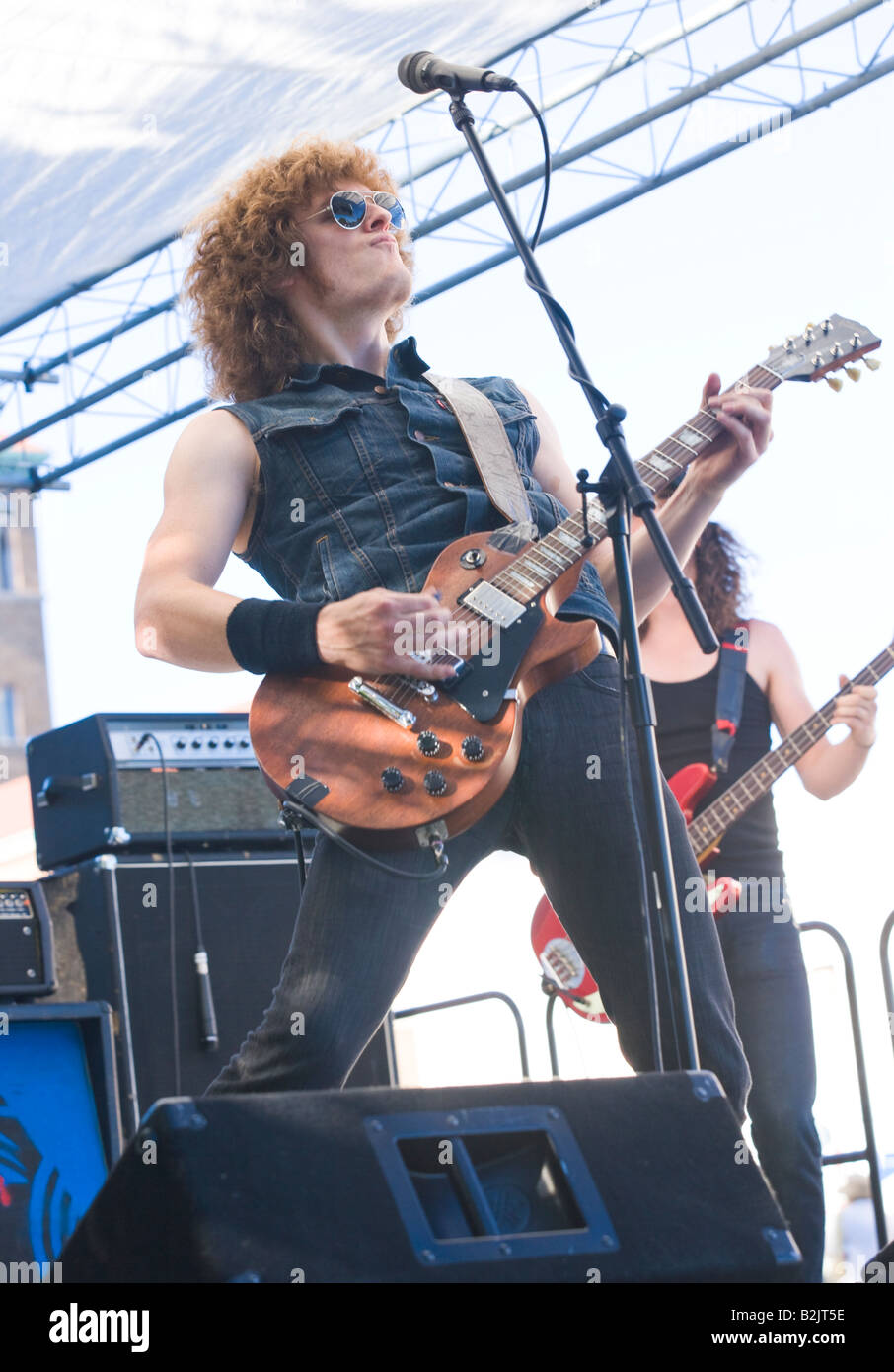 Photographs of rock and roll band Shim playing at the North stage at ...