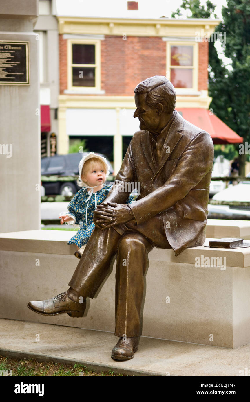 Little Girl Sitting Beside Bronze Statue of Frank O Bannon Newspaperman ...