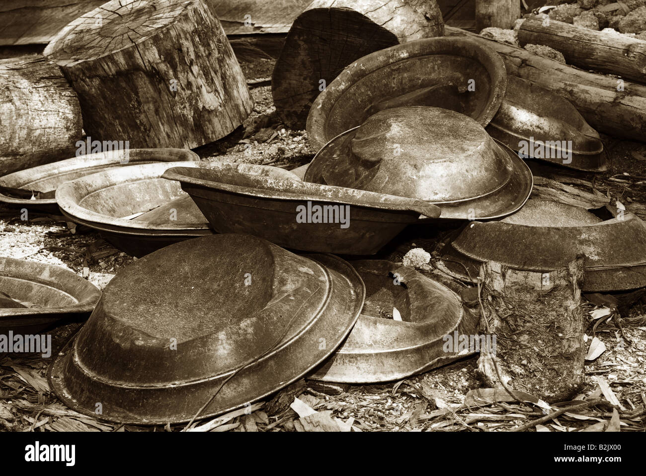 pile of gold pans from failed attempts Stock Photo - Alamy