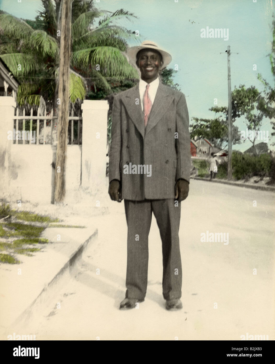 Circa 1920s hand tinted photograph of an African American man, possibly ...