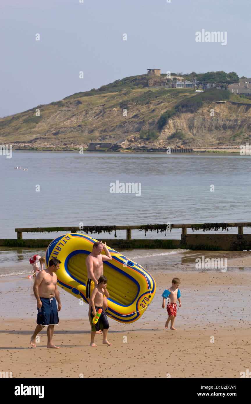 Families enjoy hot summer day on the beach in Colwell Bay Isle of Wight ...