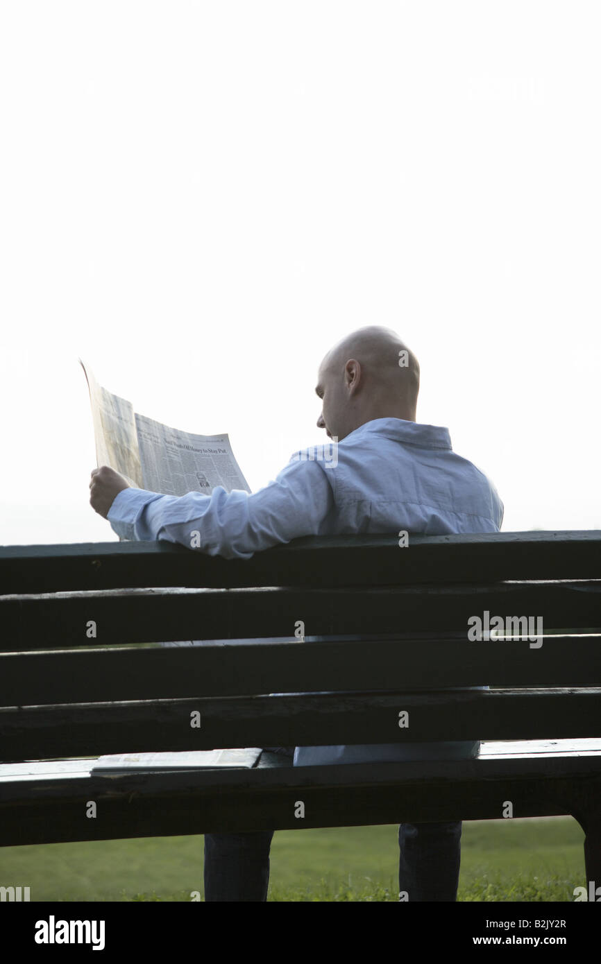 man on park bench Stock Photo - Alamy