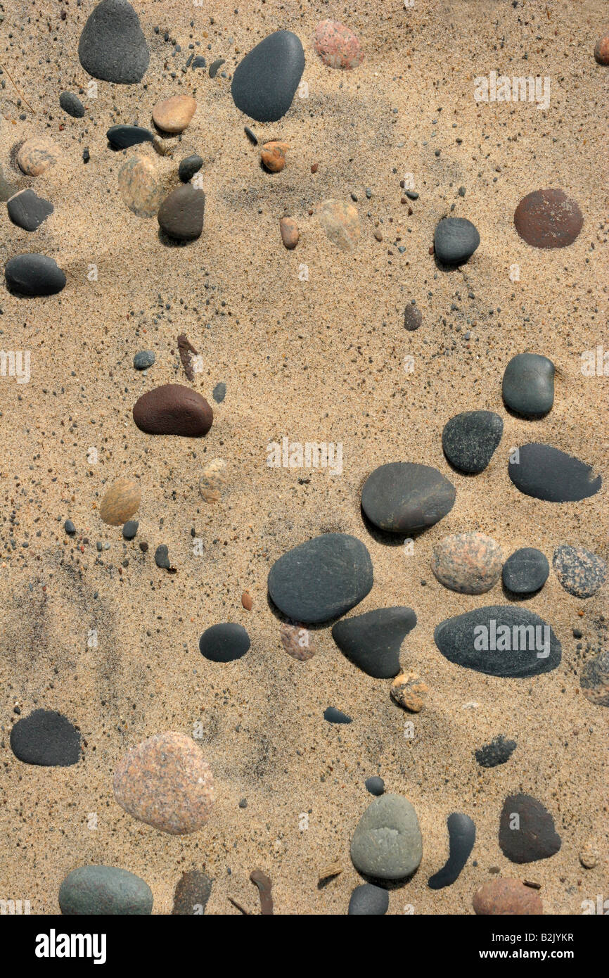 Many washed up rounded stones on the shoreline of Lake Superior in ...
