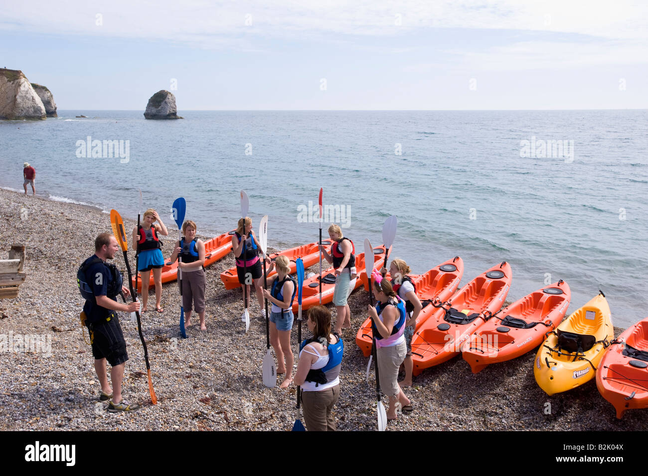 Group of teenage girls setting out on a kayaking trip around Freshwater ...